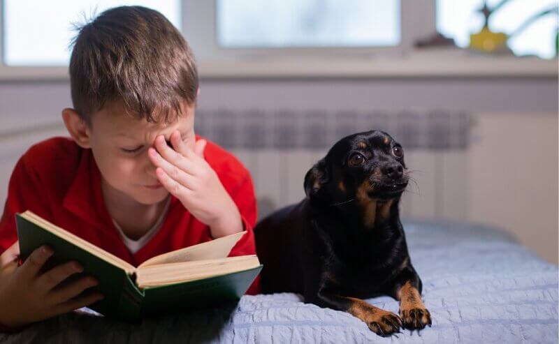 Reading Therapy Dogs Boost Literacy Confidence in Kids - Canine Campus ...
